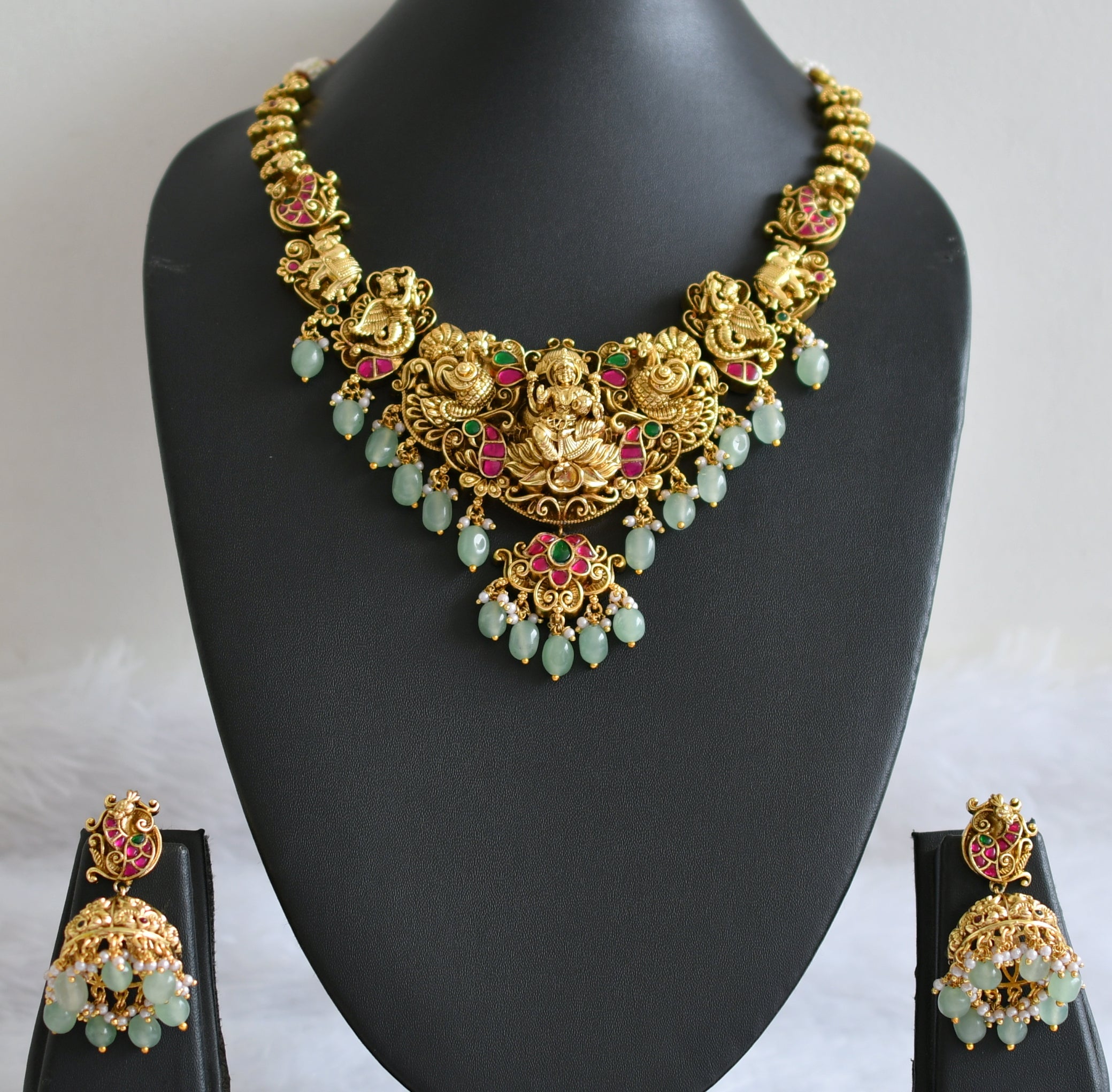 Antique gold tone pink-green kundan jadau sea green beaded lakshmi pea – dreamjwell