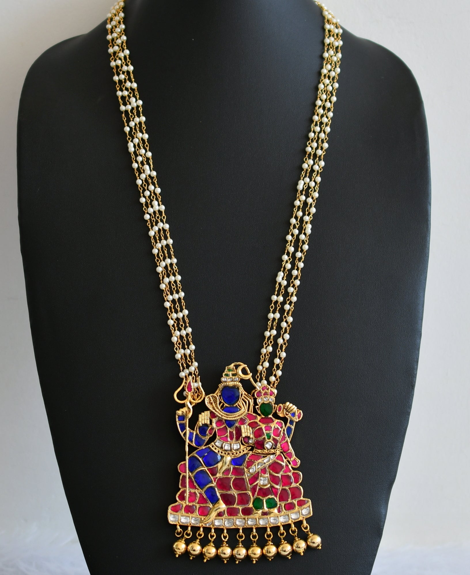 Gold tone pink-green-white-blue kundan jadau shiva-parvathi pendant wi – dreamjwell