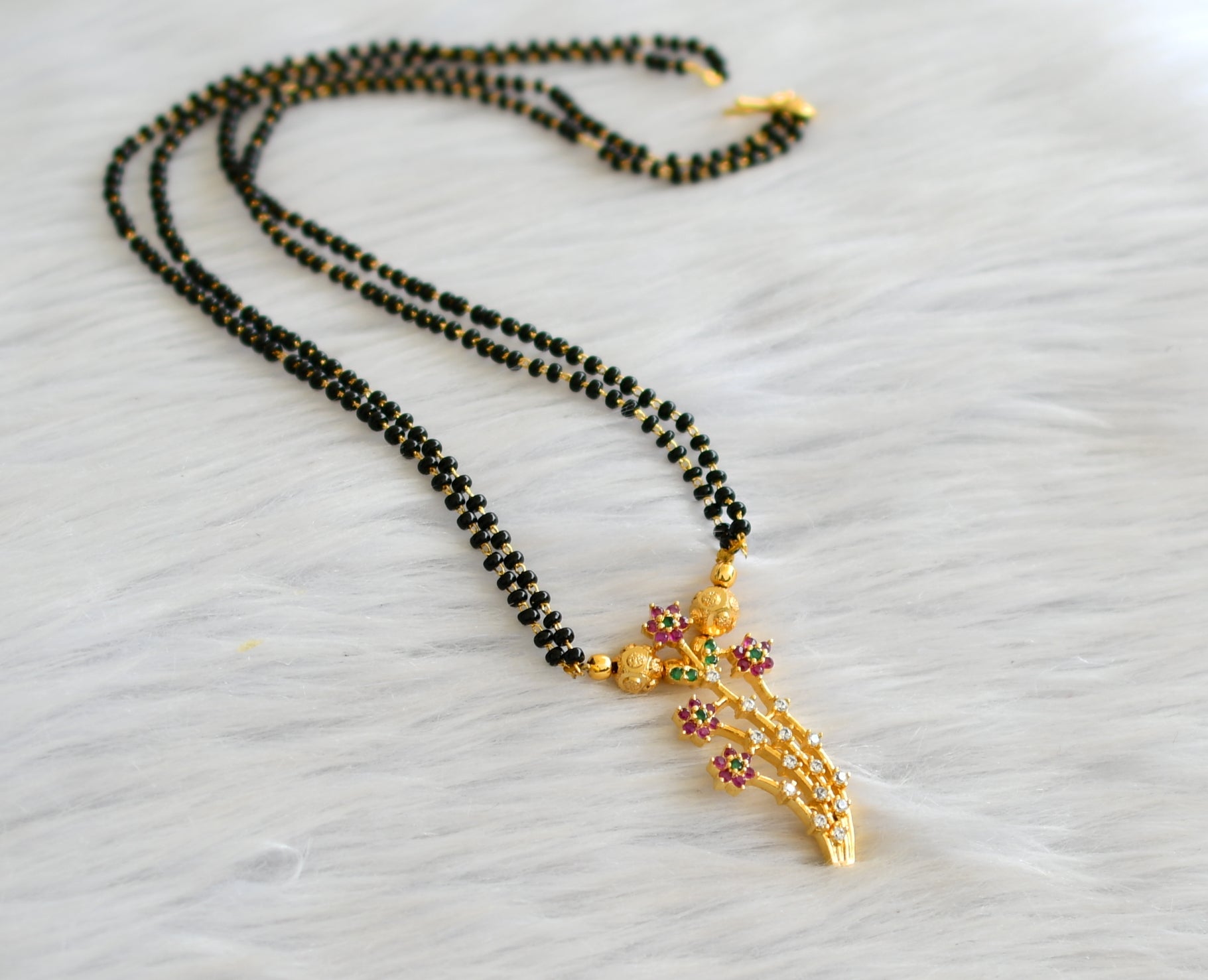 Gold tone ruby-green-white flower mangalsutra dj-43631 – dreamjwell