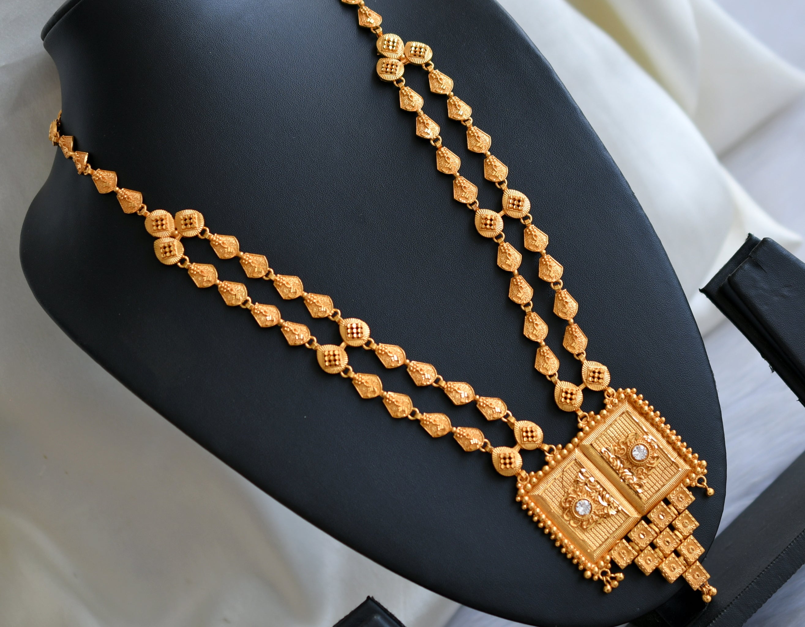 Matte gold finish cz white kerala style haar dj-43824 – dreamjwell