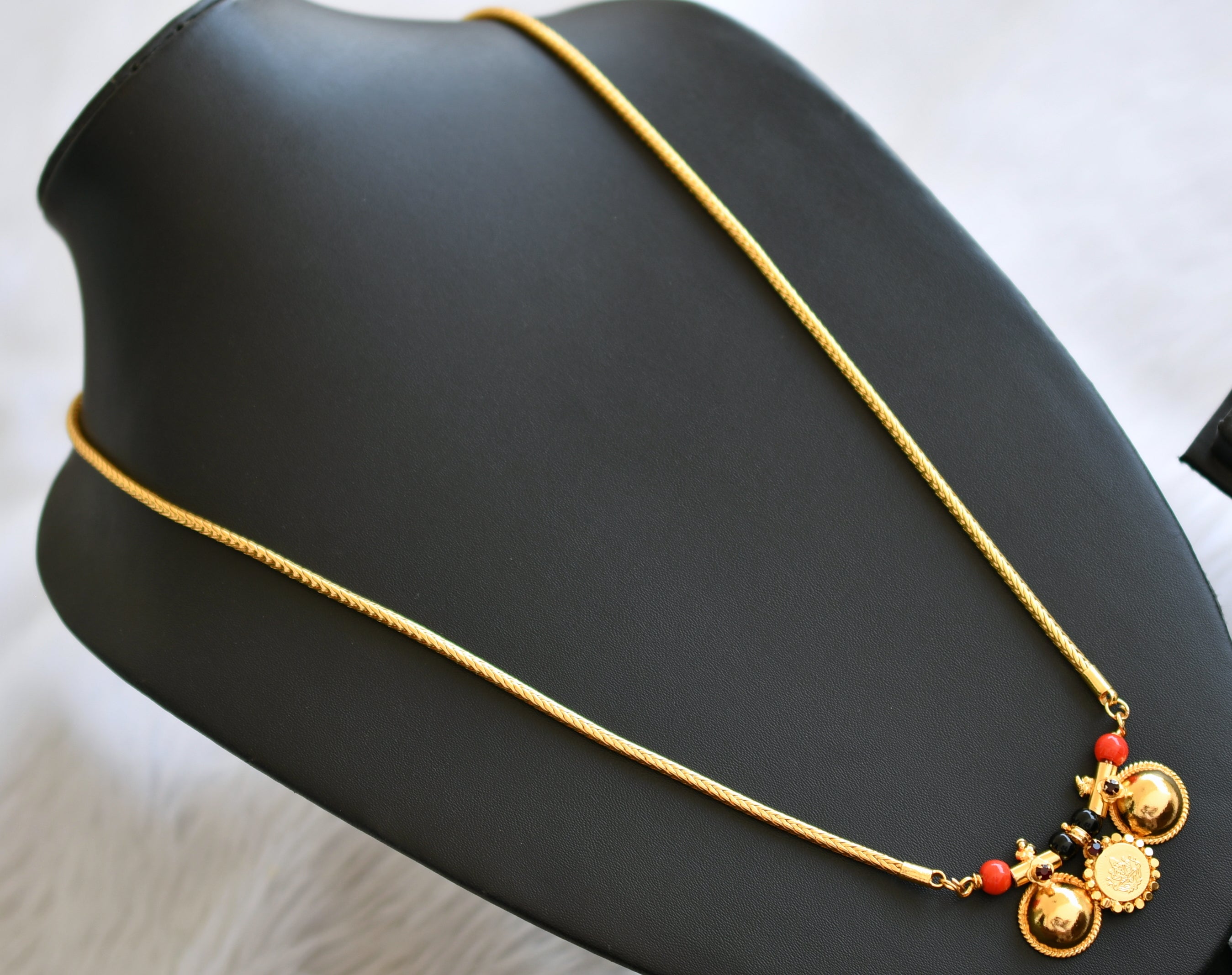 Gold tone 24 inches chain with coral-black bead lakshmi coin bottu man ...
