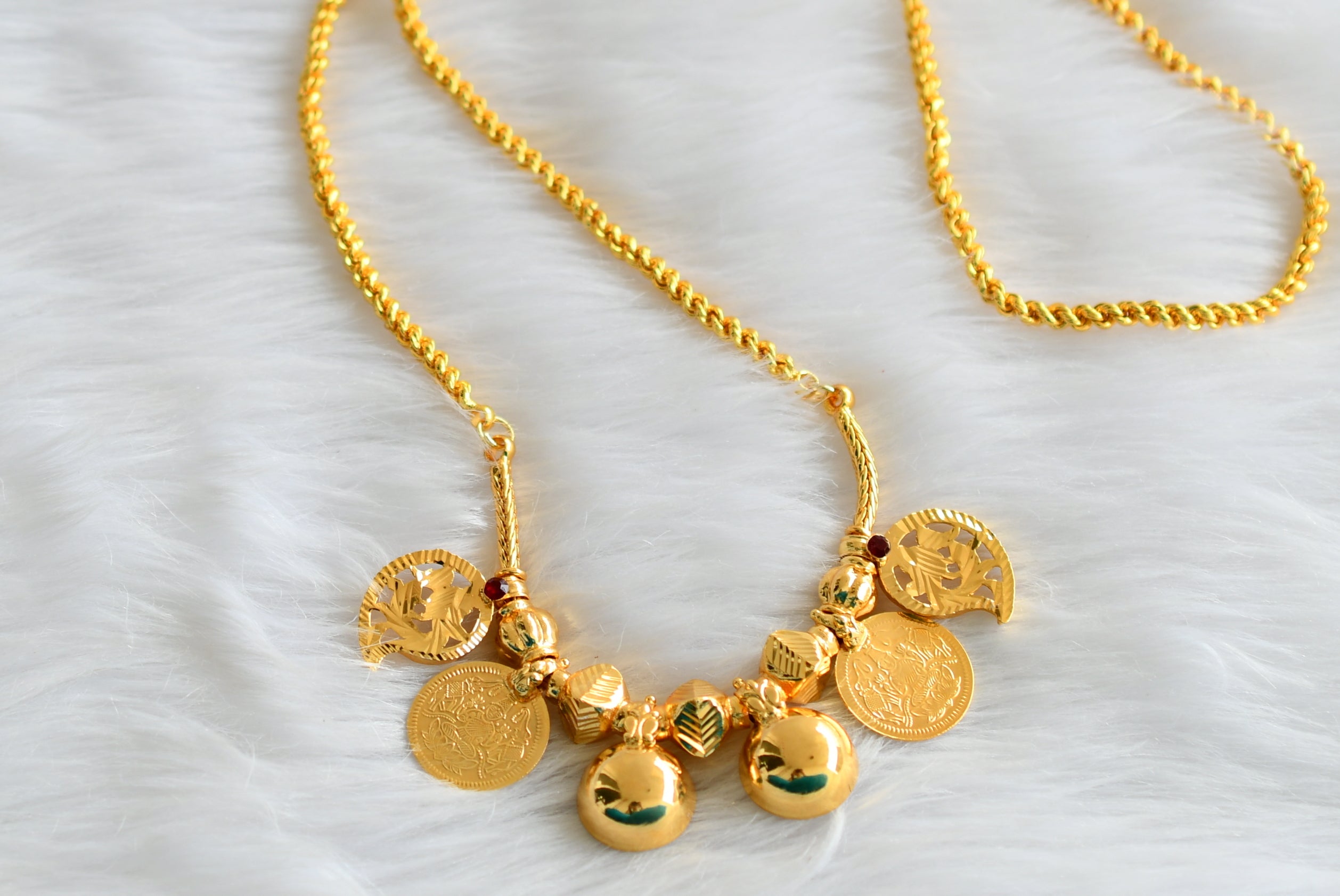 Gold tone 24 inches rope chain with swan mango lakshmi coin bottu mang ...