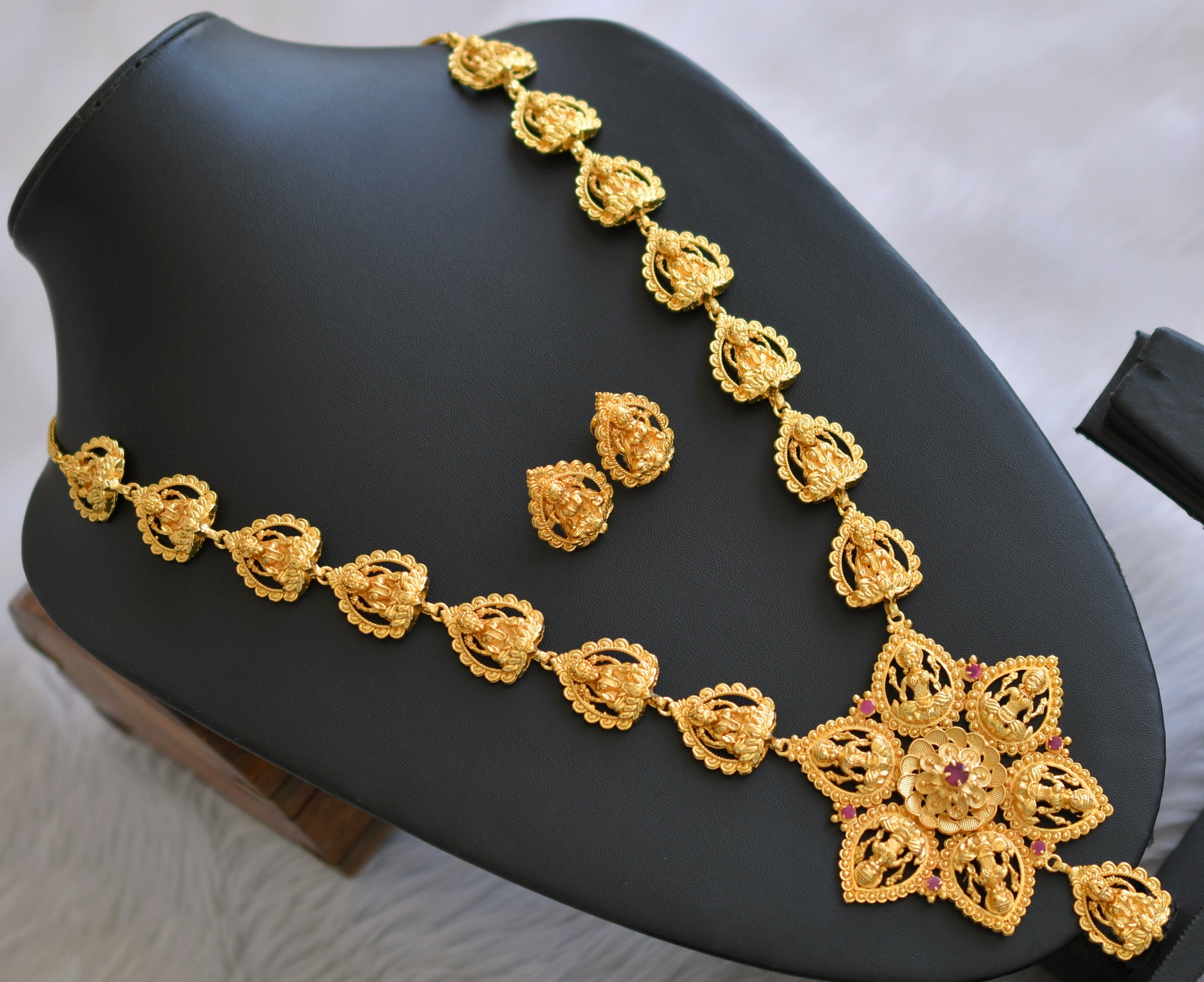 Gold tone kerala style ruby lakshmi flower haar set dj-43463 – dreamjwell