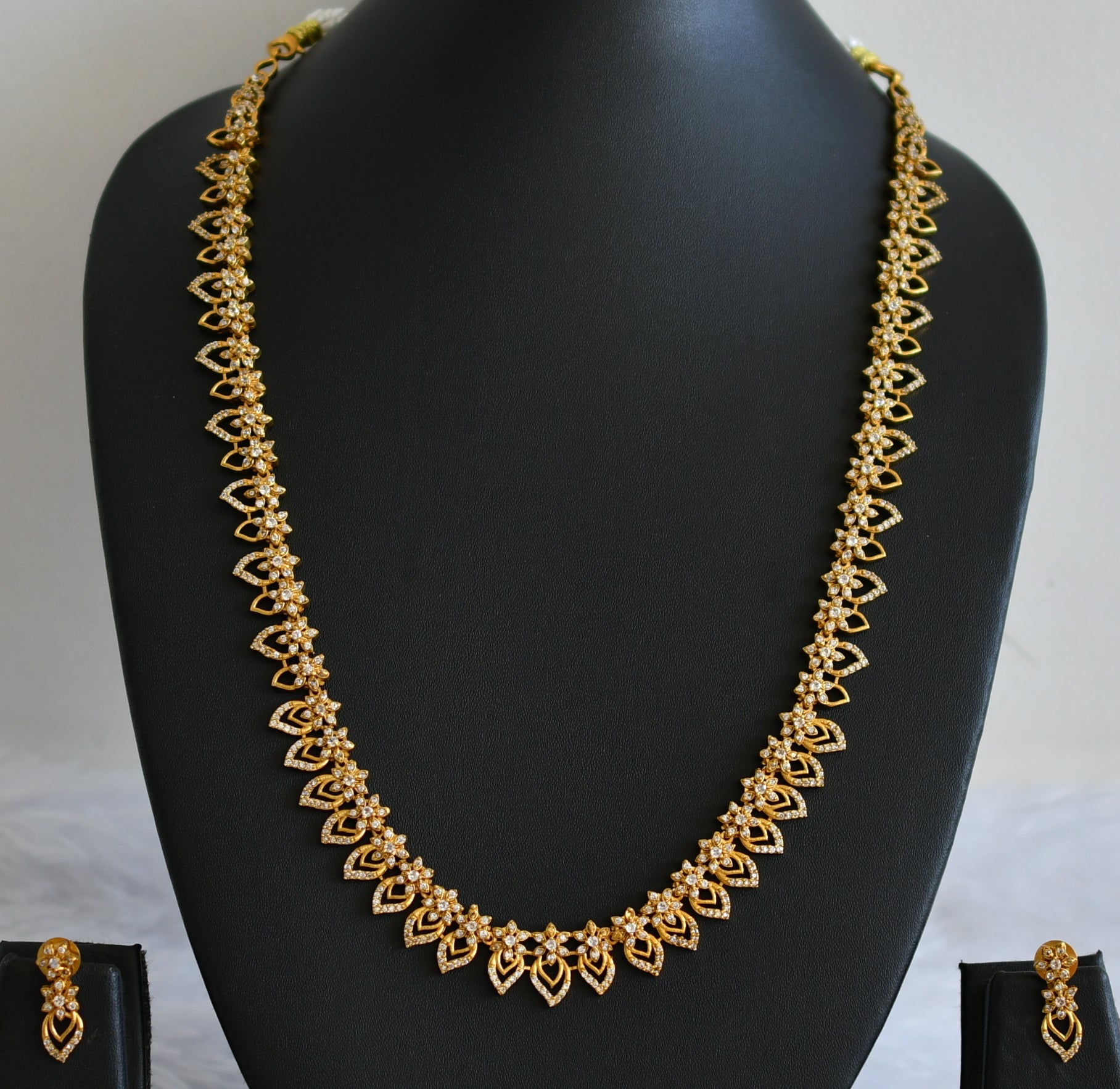 Matte finish cz white stone mango flower haar set dj-44387 – dreamjwell