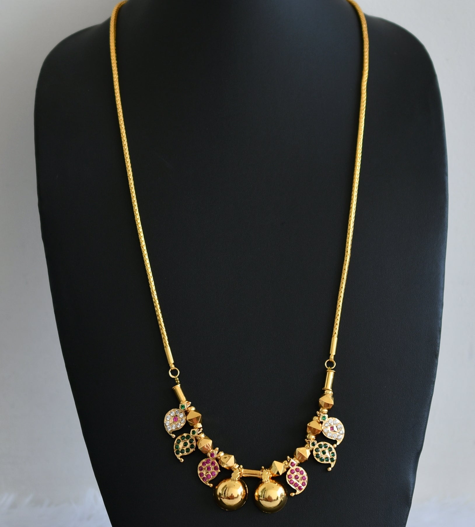 Gold tone 24 inches kodi chain with pink-green-white stone mango bottu ...