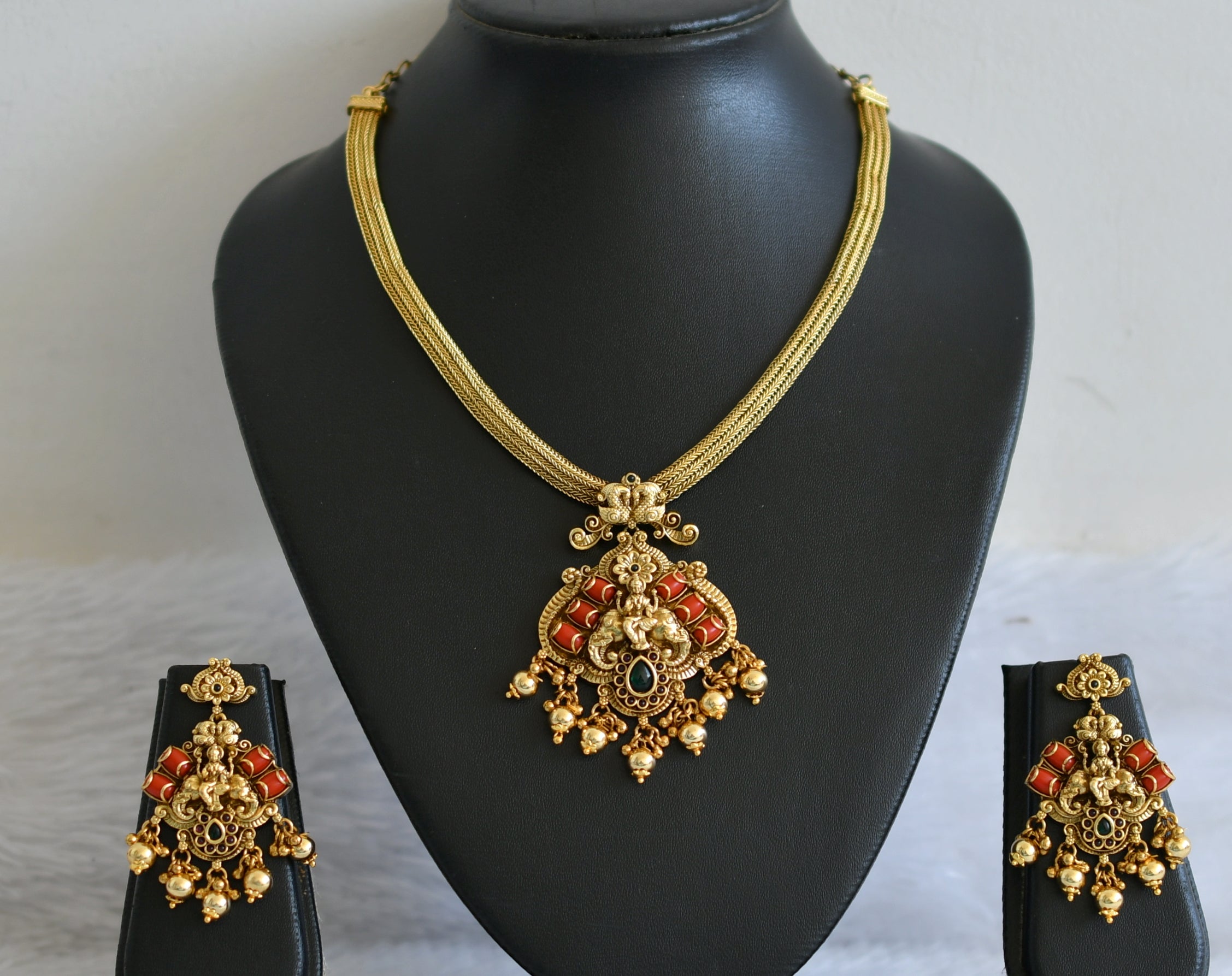 Antique gold tone kemp-green coral stone gaja lakshmi peacock nakshi n ...