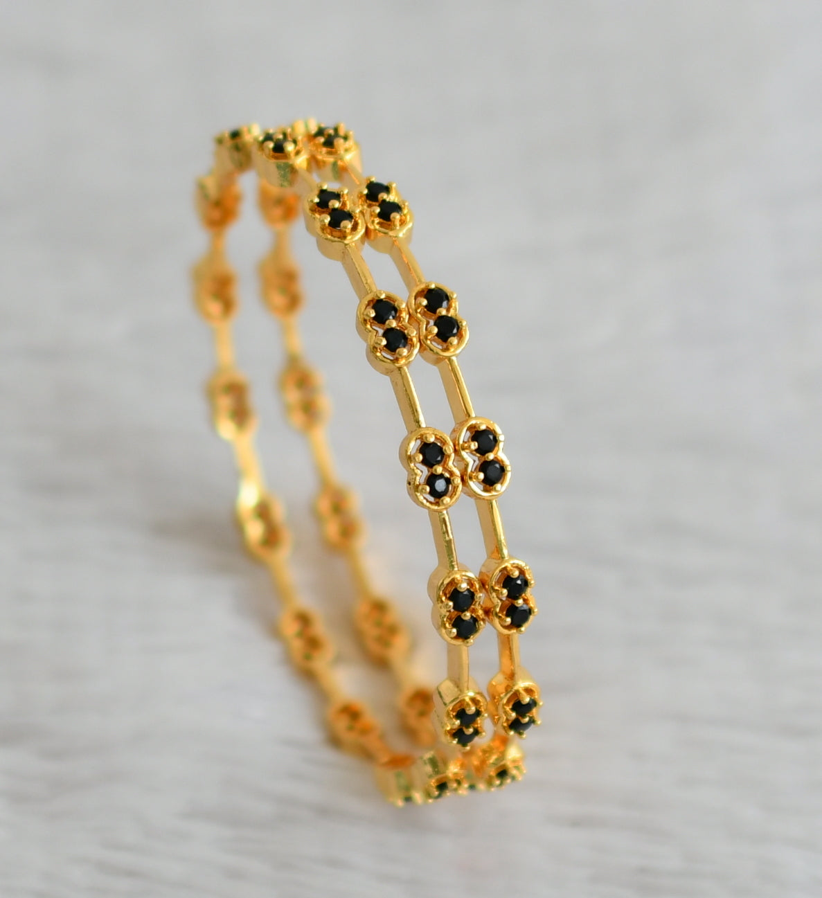 Gold tone black stone bangles(2.4) dj-48129 – dreamjwell