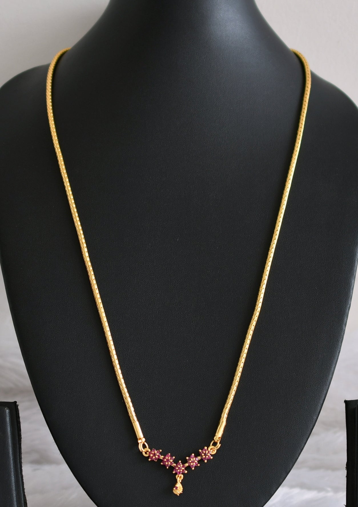 Gold tone 24 inches kodi chain with ruby stone flower pendant dj-48258 ...