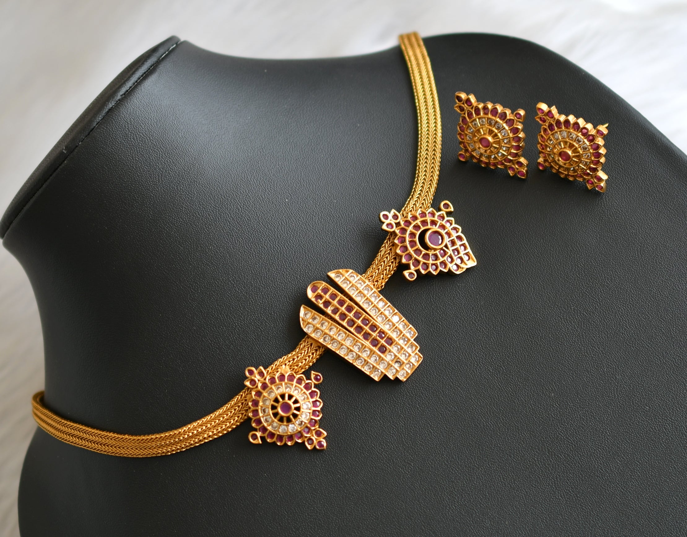 Matte finish ruby-white Nama-Shanku-Chakra necklace set dj-41477 ...