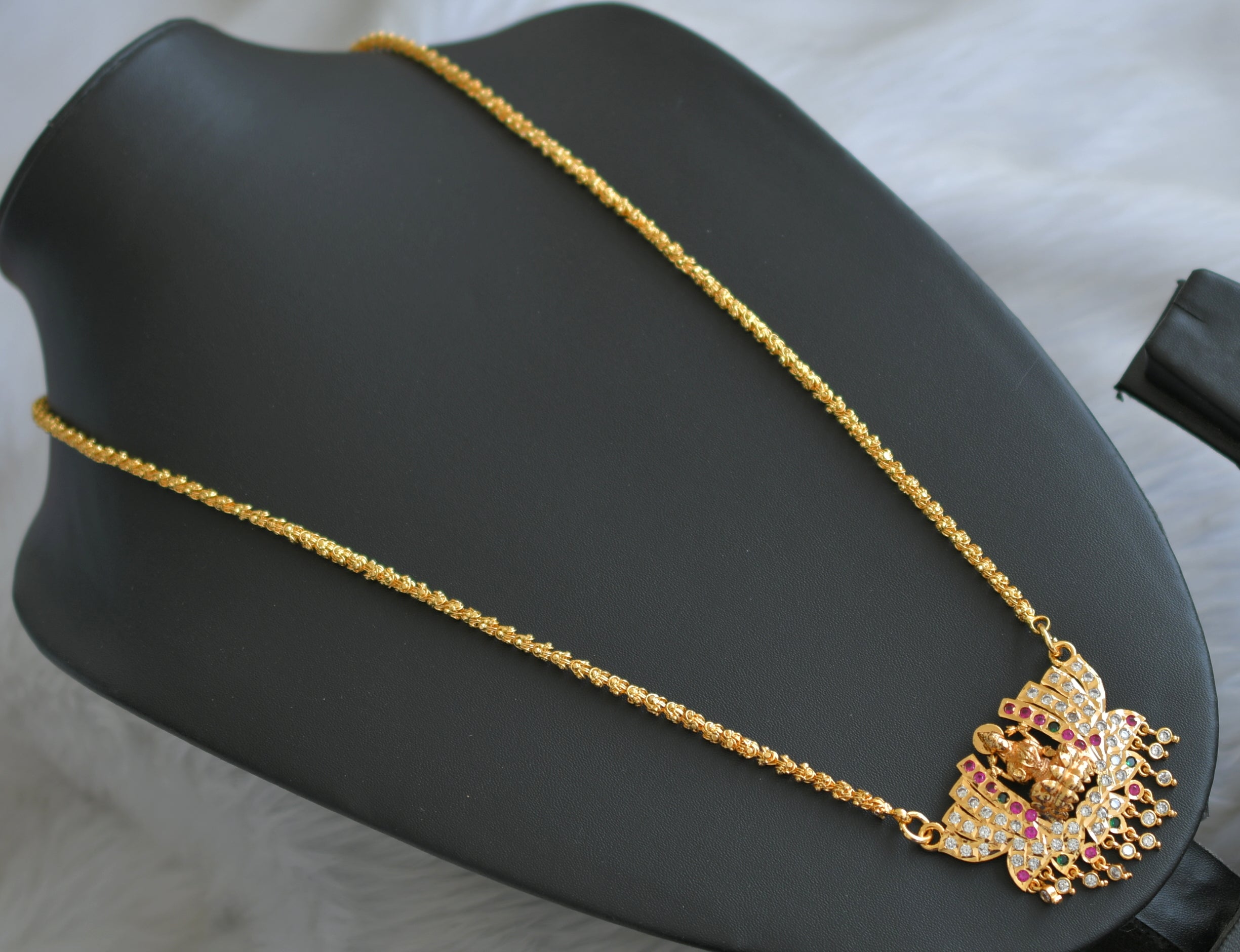 Gold tone white-ruby-green stone Lakshmi-Lotus south Indian style pend ...