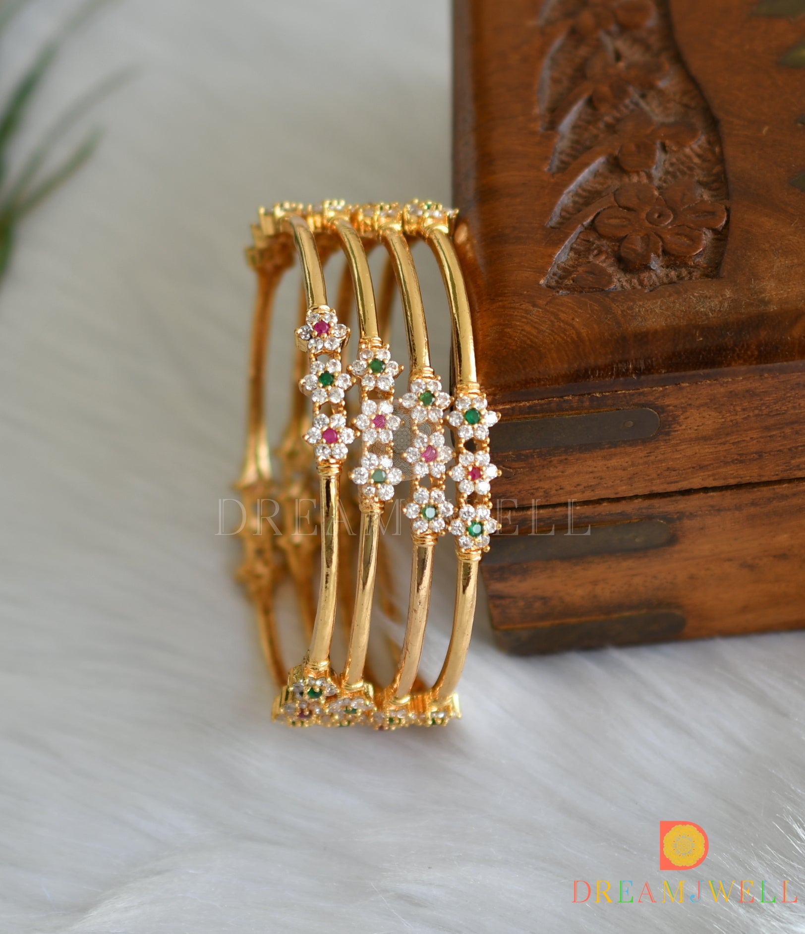DREAMJWELL - Beautiful Gold Tone Cz Ruby-green nakshatra Designer Se ...