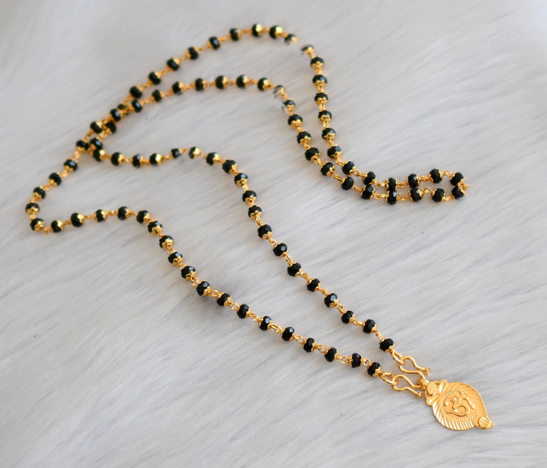 Gold tone black/karimani chain with 'om' Pendant dj-41901 – dreamjwell